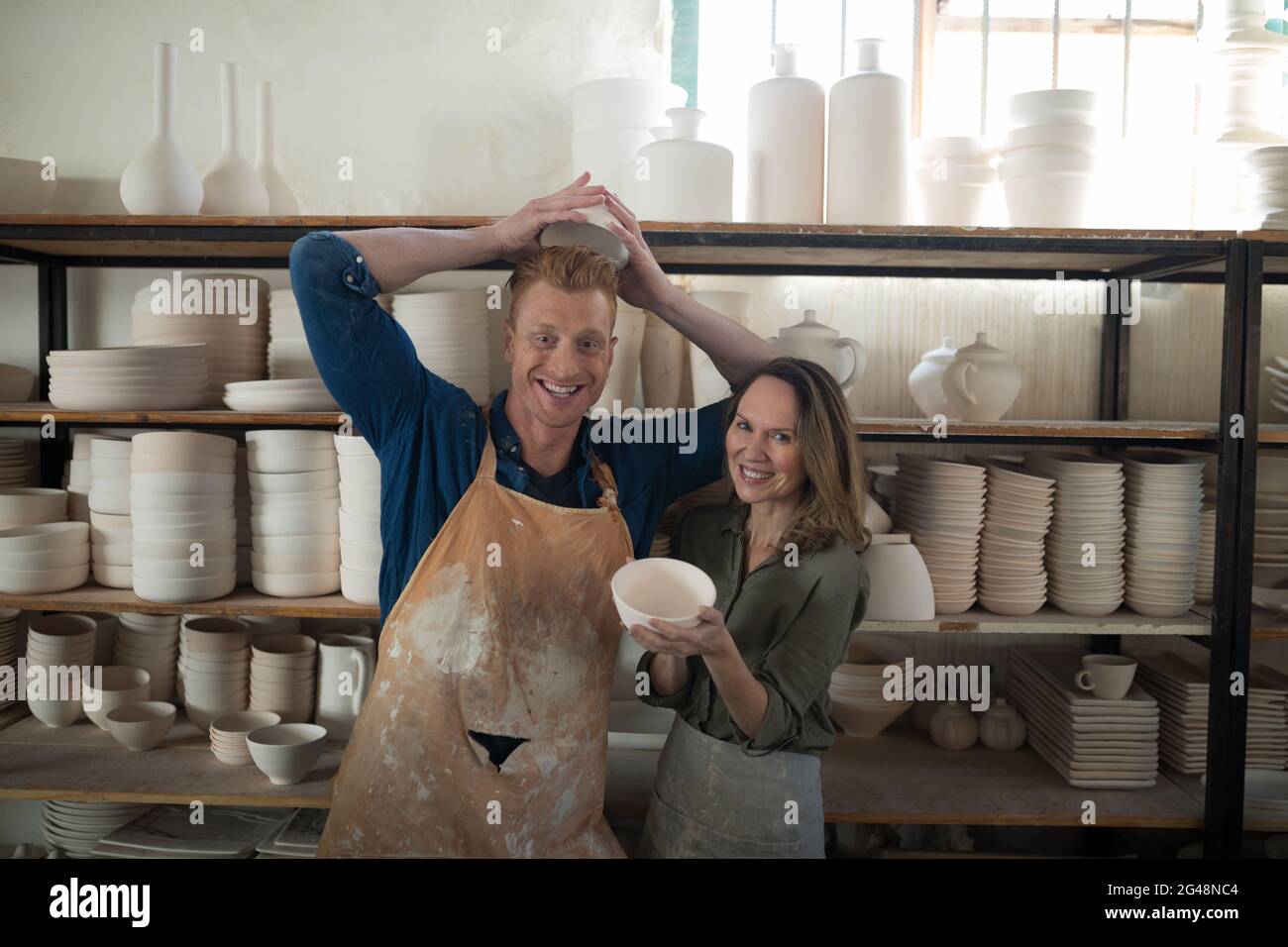 Portrait female potter holding hi-res stock photography and images - Alamy