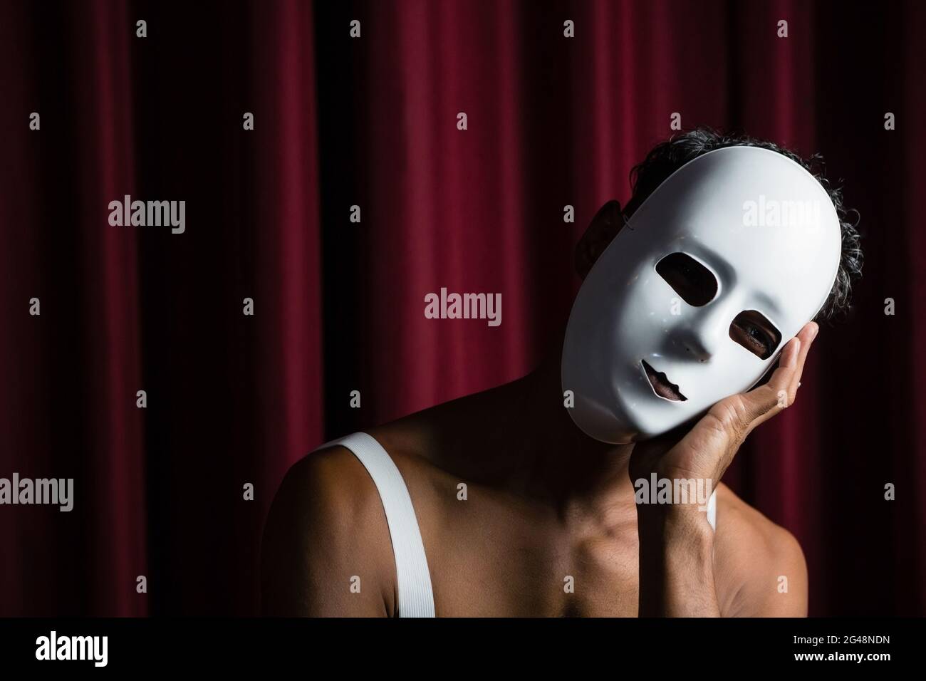 Artist wearing white mask on his face Stock Photo - Alamy