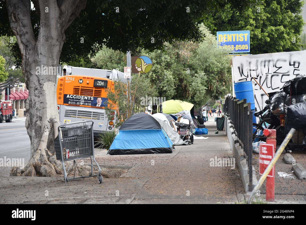 Los Angeles, CA USA - May 26 , 2021: Homeless encampment on a sidewalk ...