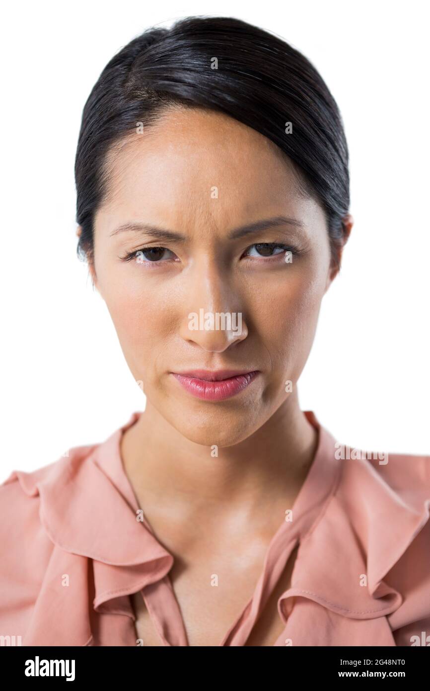 Confident female executive against white background Stock Photo - Alamy