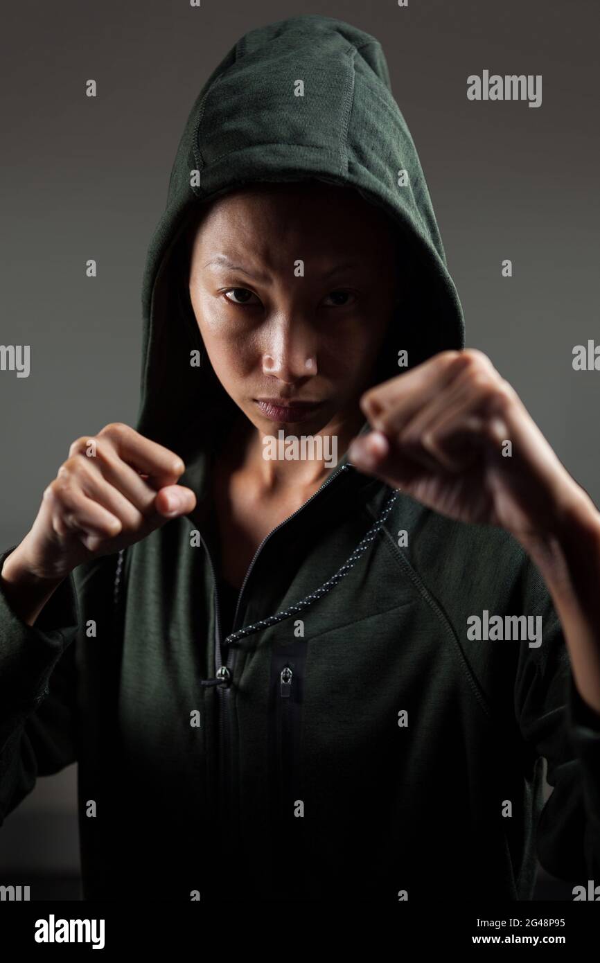 Focused determined asian woman hi-res stock photography and images - Alamy