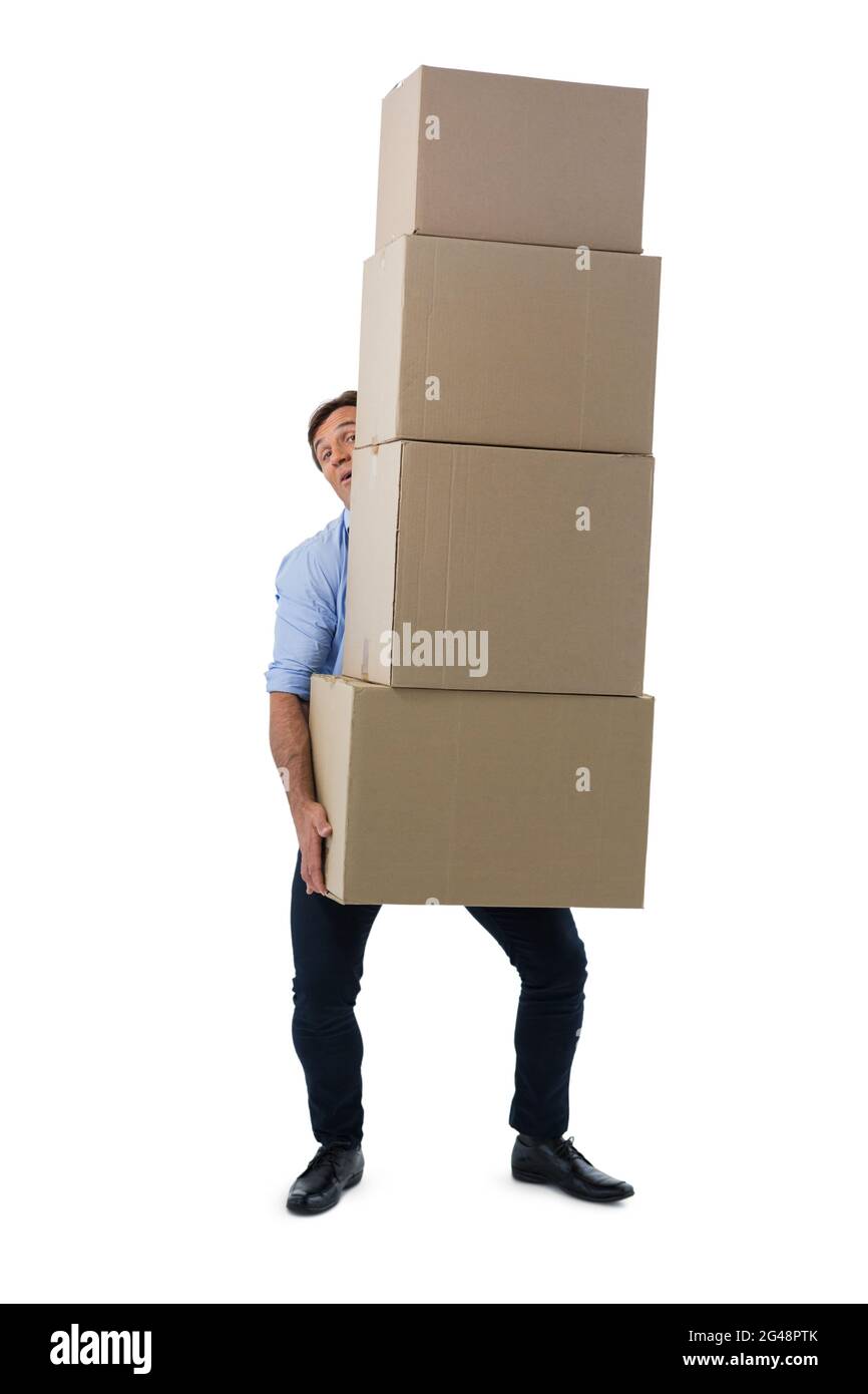 Male executive carrying stack of cardboard boxes Stock Photo - Alamy