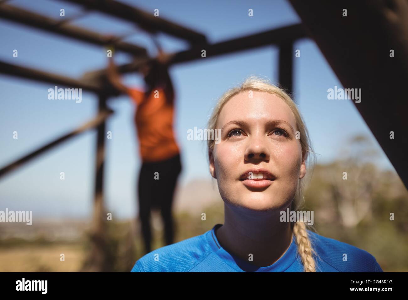 Thoughtful young woman exercising hi-res stock photography and images ...