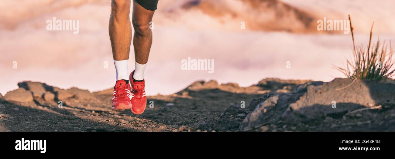 Running shoes of runner training endurance on trail run outdoors in ...