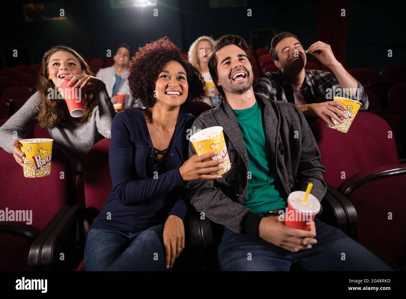 Group of people watching movie Stock Photo - Alamy