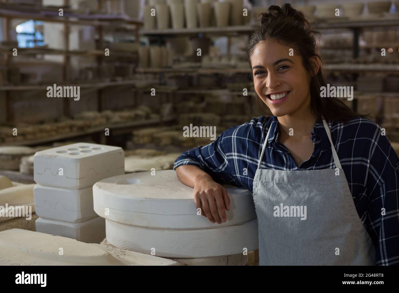 Beautiful female potter standing in hi-res stock photography and images ...