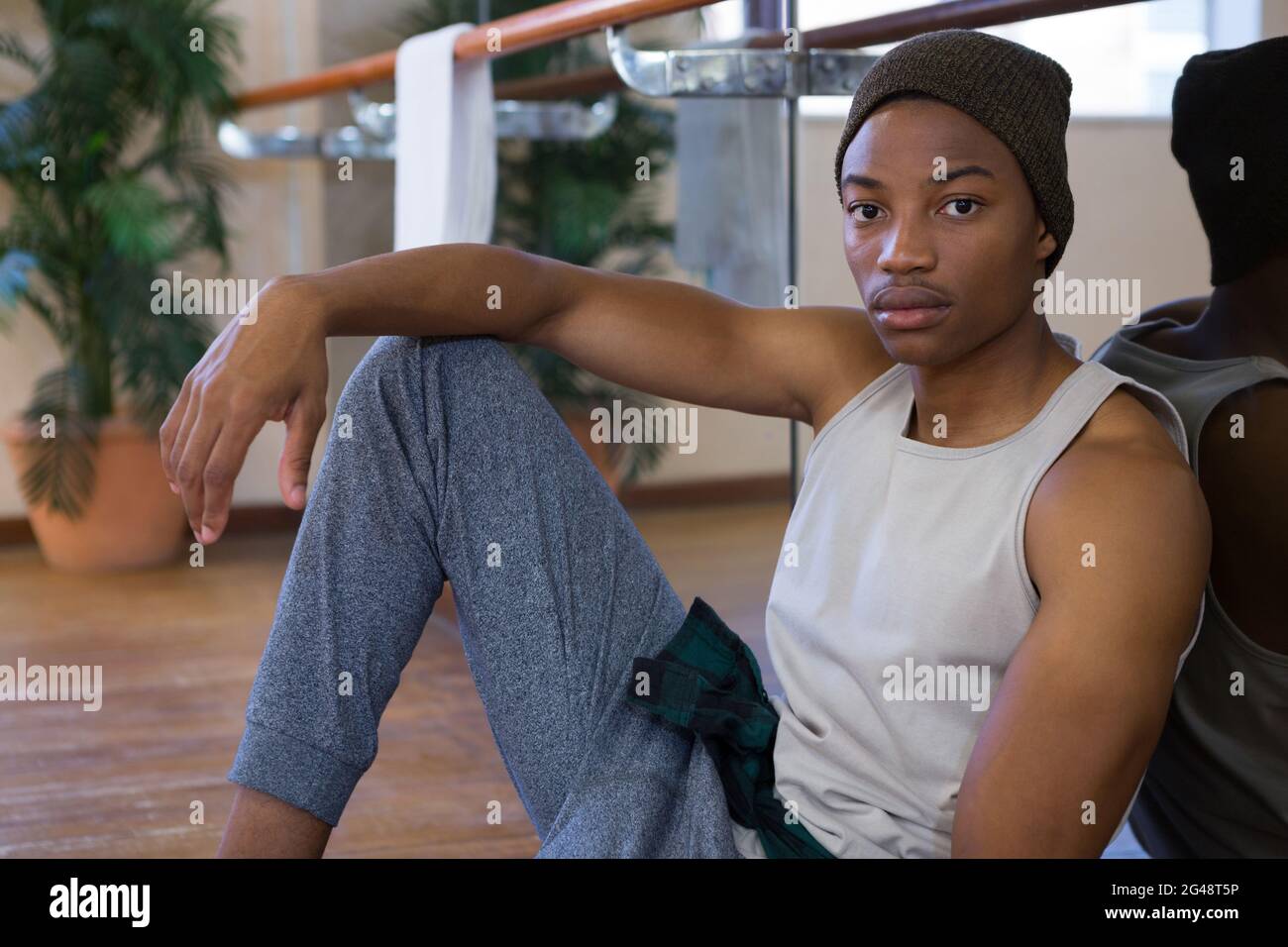 Portrait of tired male dancer at studio Stock Photo - Alamy