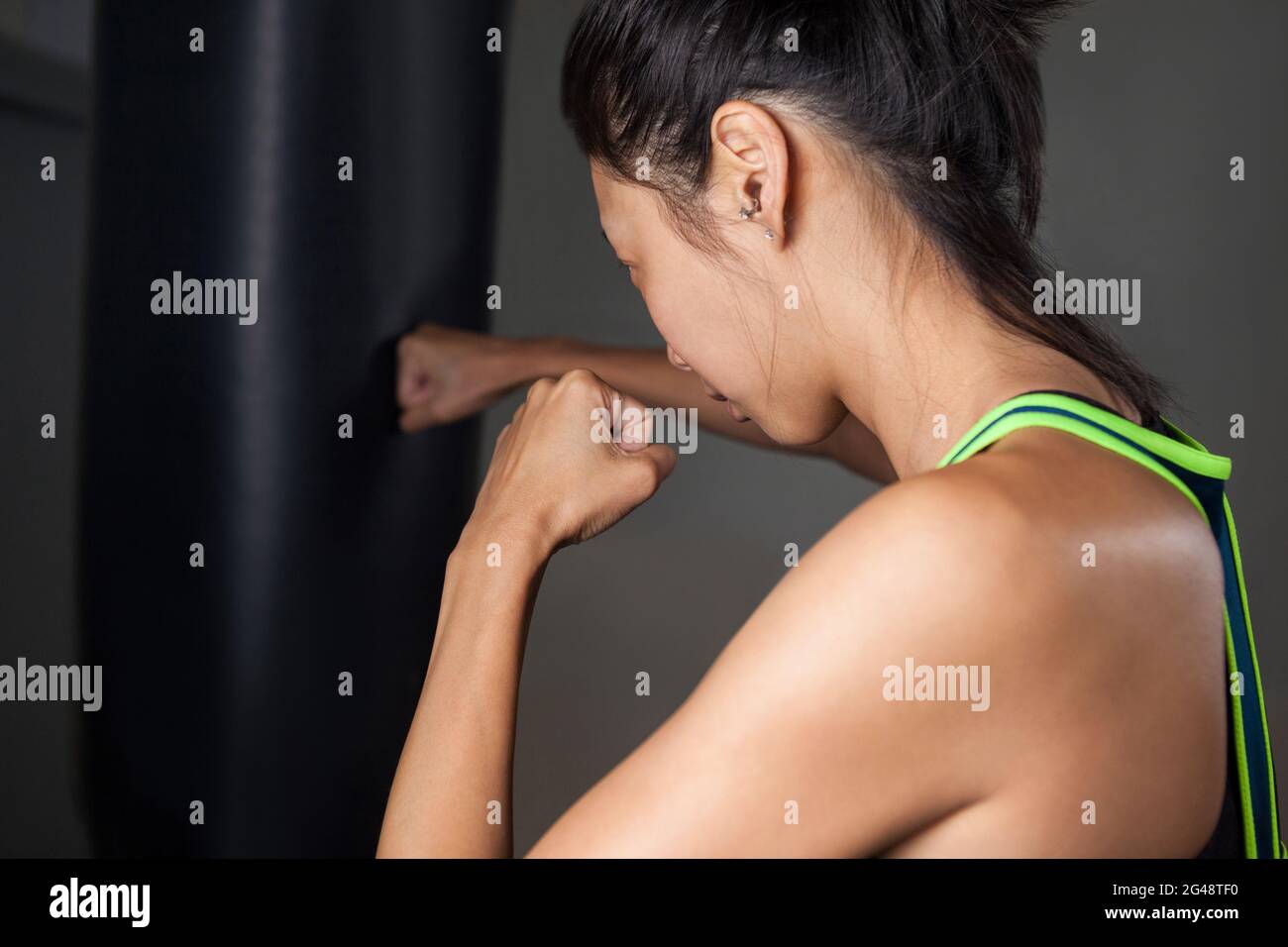 Focused woman practicing boxing hi-res stock photography and images - Alamy