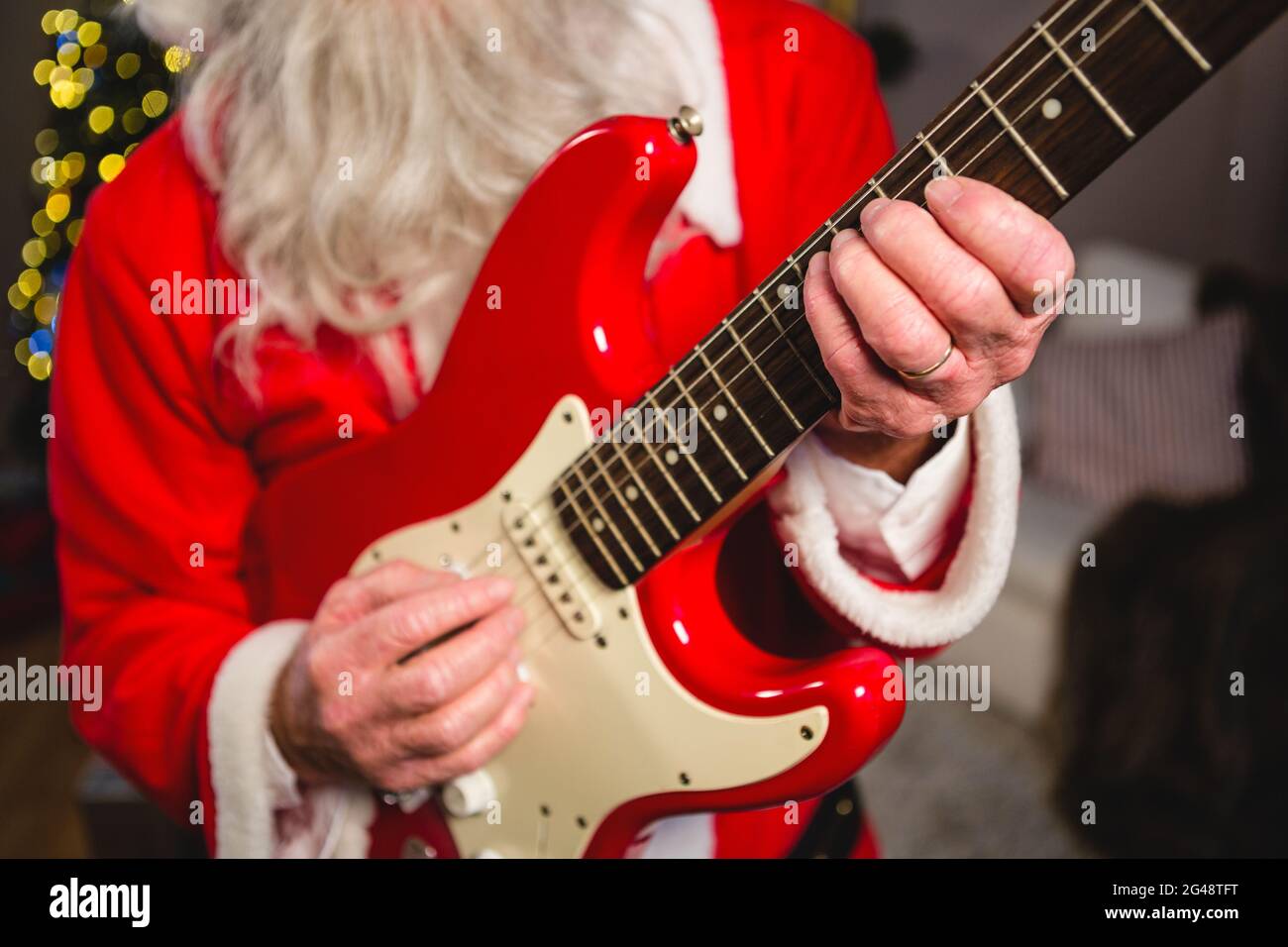 Santa claus standing guitar hi-res stock photography and images - Alamy