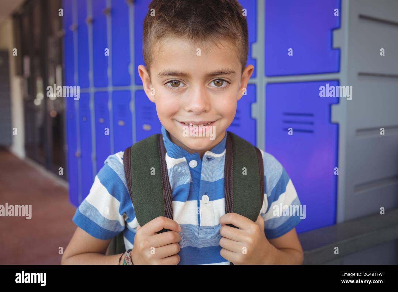 Side by side looking at camera standing smiling childhood hi-res stock ...