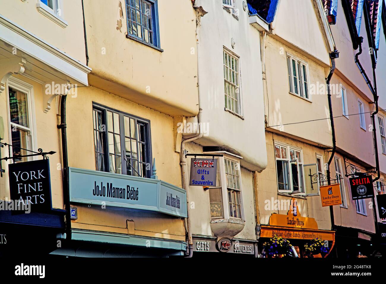 Shops and Period Architecture, Low Petergate, York, England Stock Photo ...