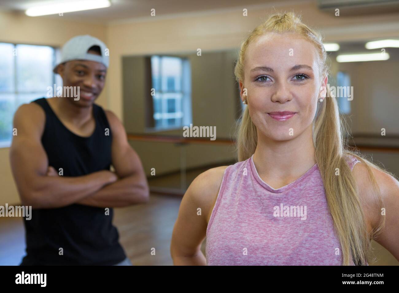 Portrait of beautiful female dancer with friend Stock Photo - Alamy
