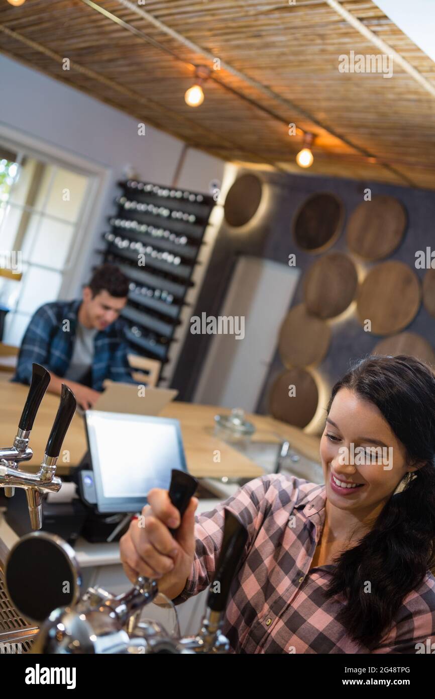 Beautiful barmaid hi-res stock photography and images - Alamy