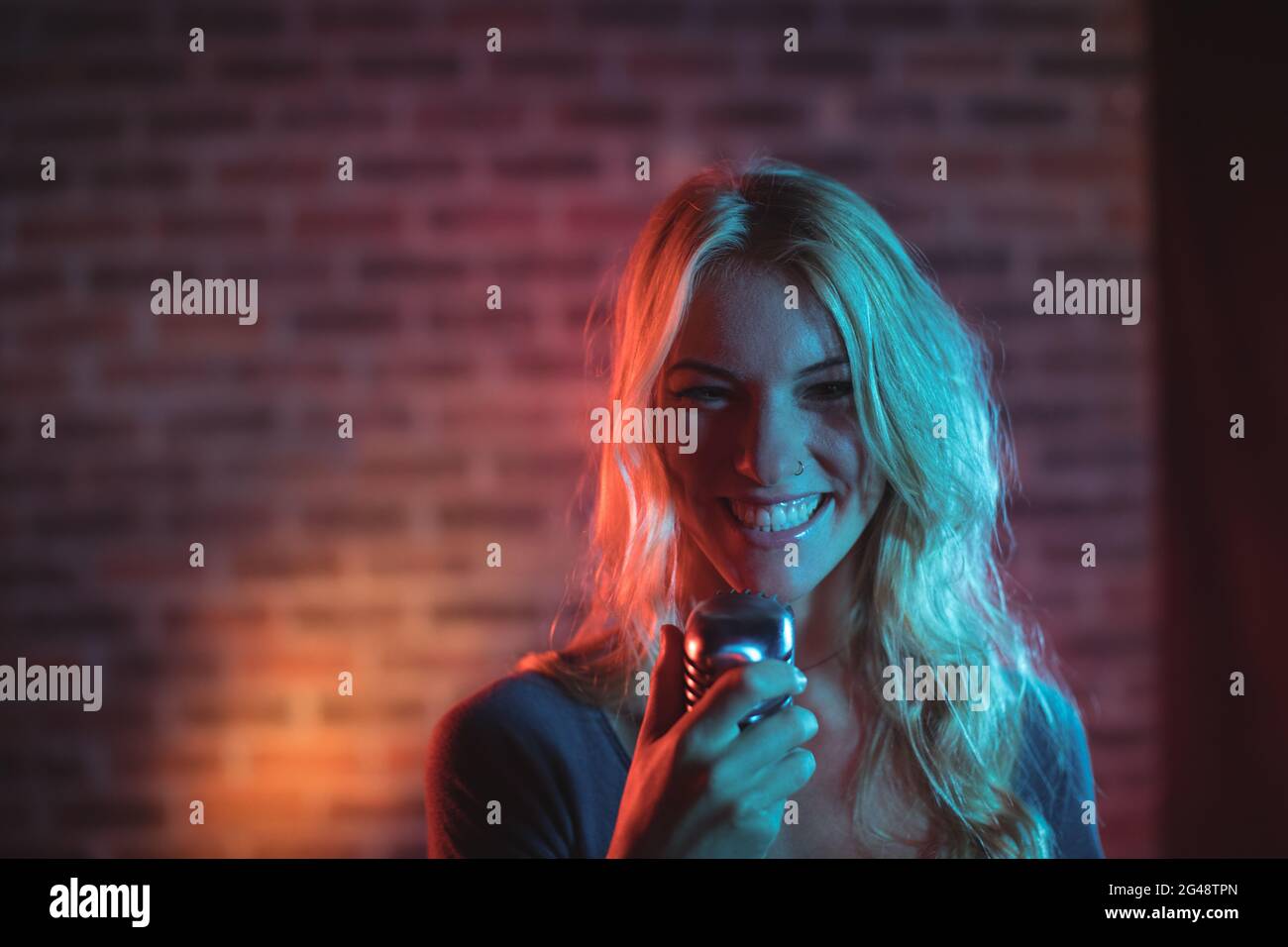 Female singer in festive hi-res stock photography and images - Alamy