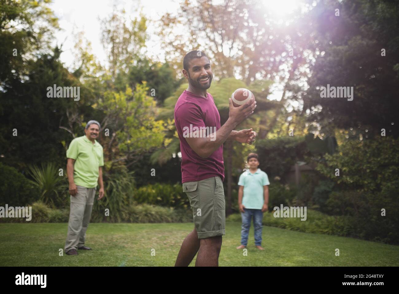 Child and playing rugby hi-res stock photography and images - Alamy
