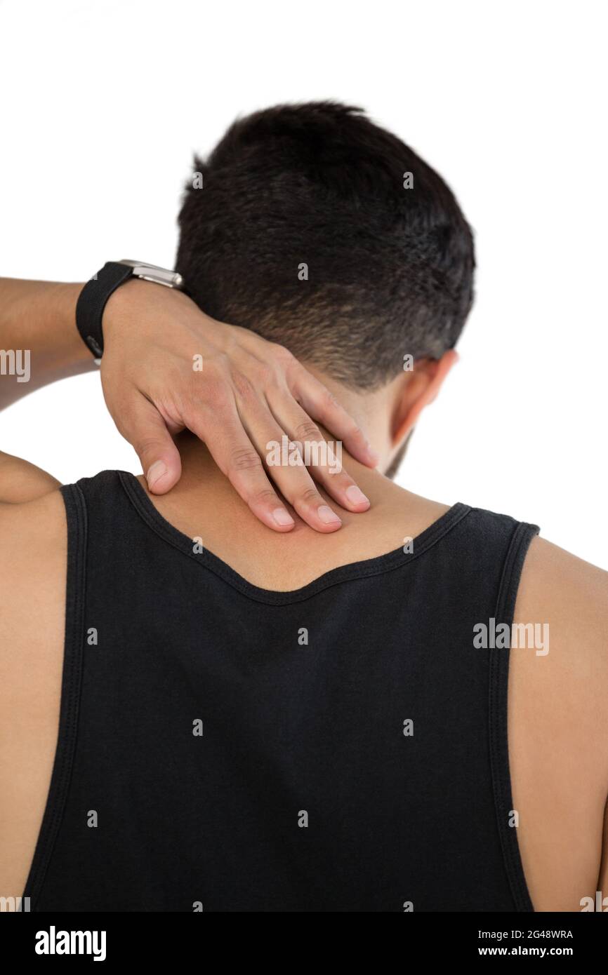 Rear view of man touching his neck Stock Photo - Alamy