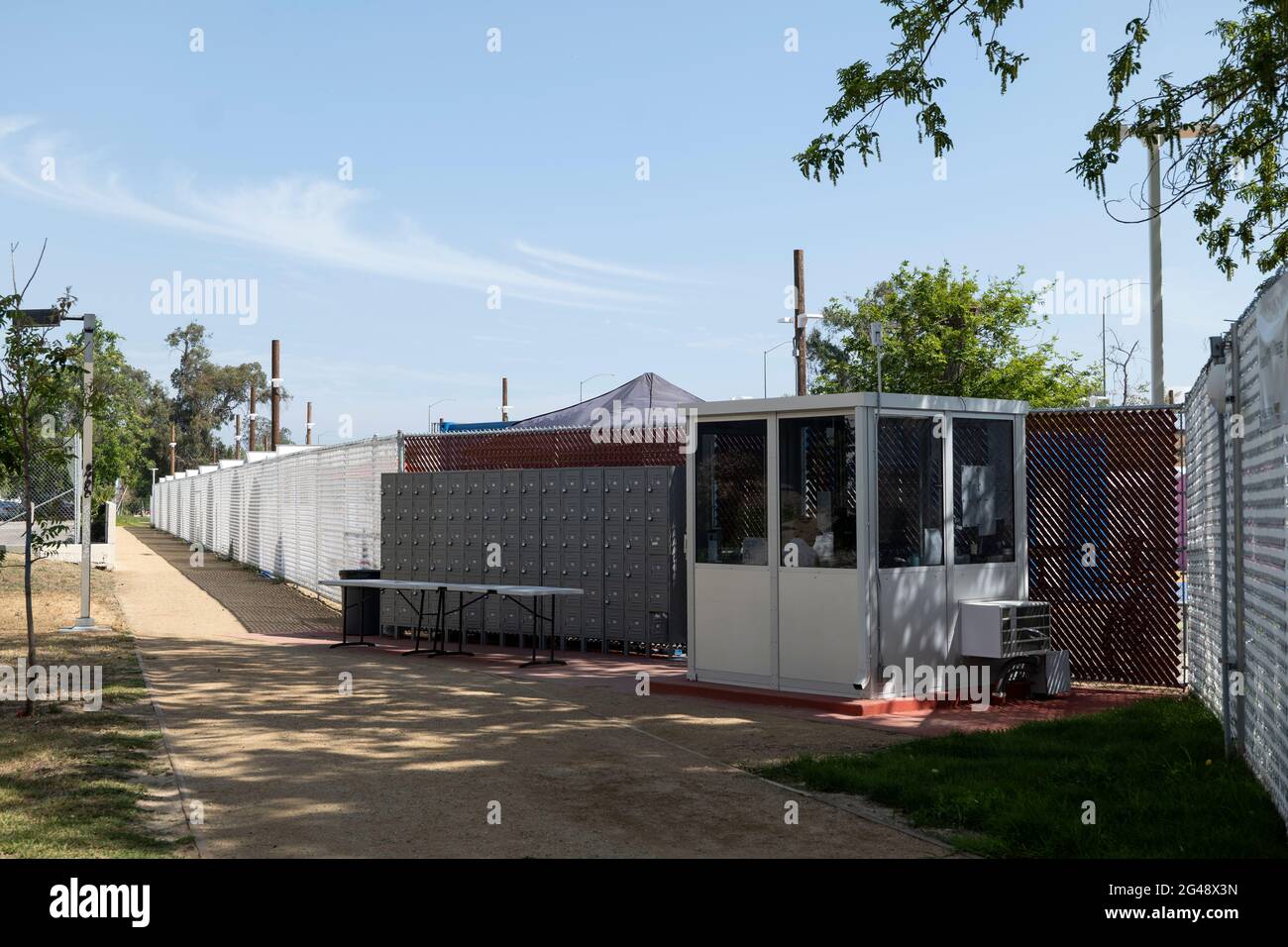 North Hollywood, CA USA - May 28, 2021: Security guard and lockers at ... North Hollywood, CA USA - May 28, 2021: Security guard and lockers at ...