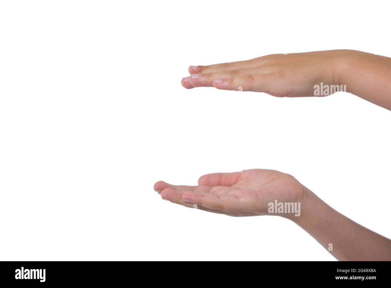 Hands of kid pretending to be holding invisible object Stock Photo - Alamy