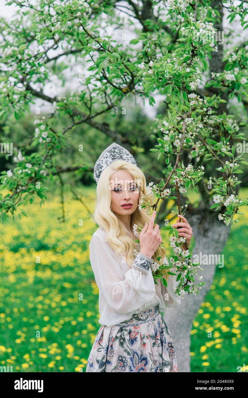 Stylish russian female in traditional national folk dress sundress and ...