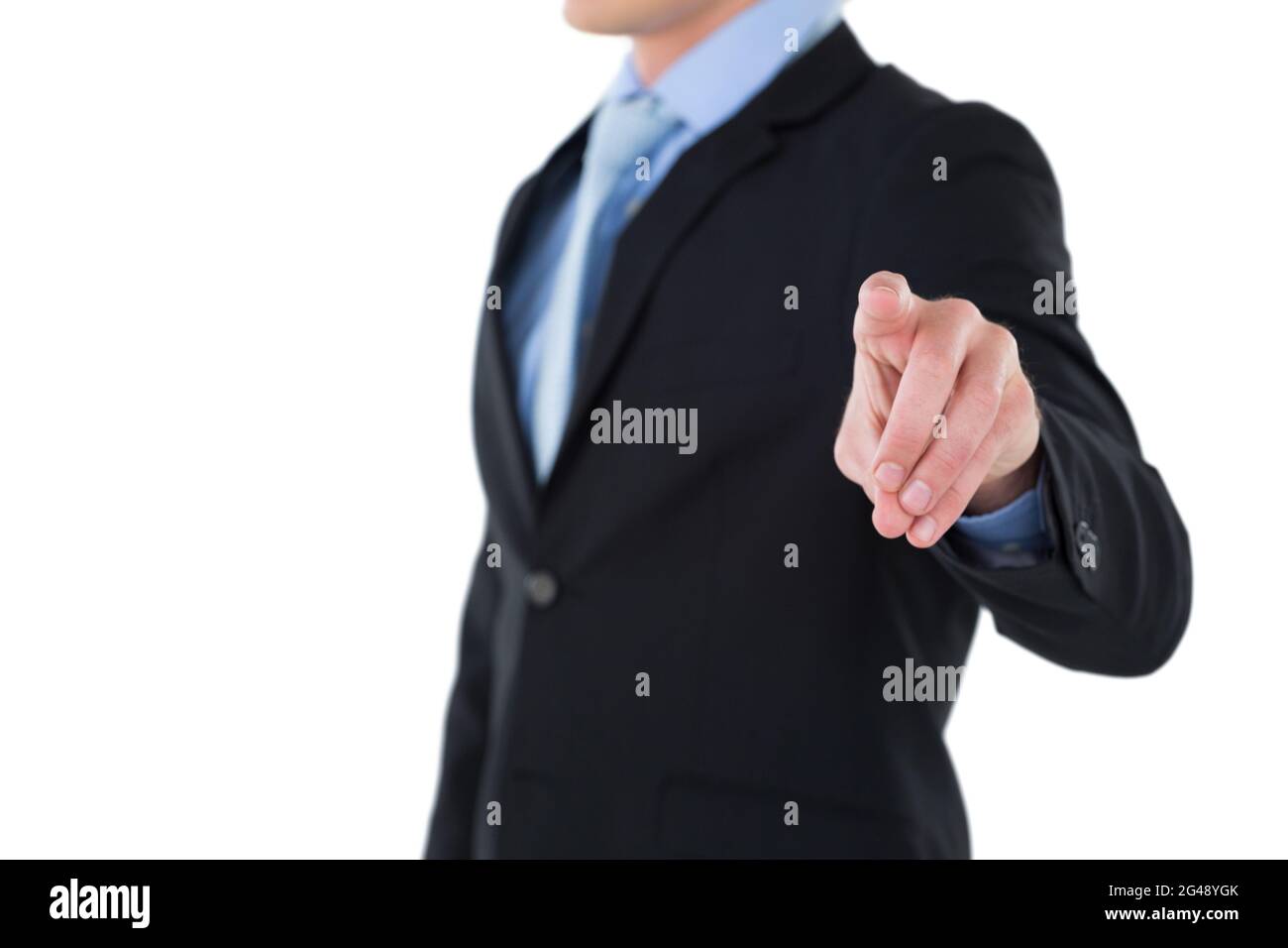 Mid section of businessman gesturing on invisible interface Stock Photo ...