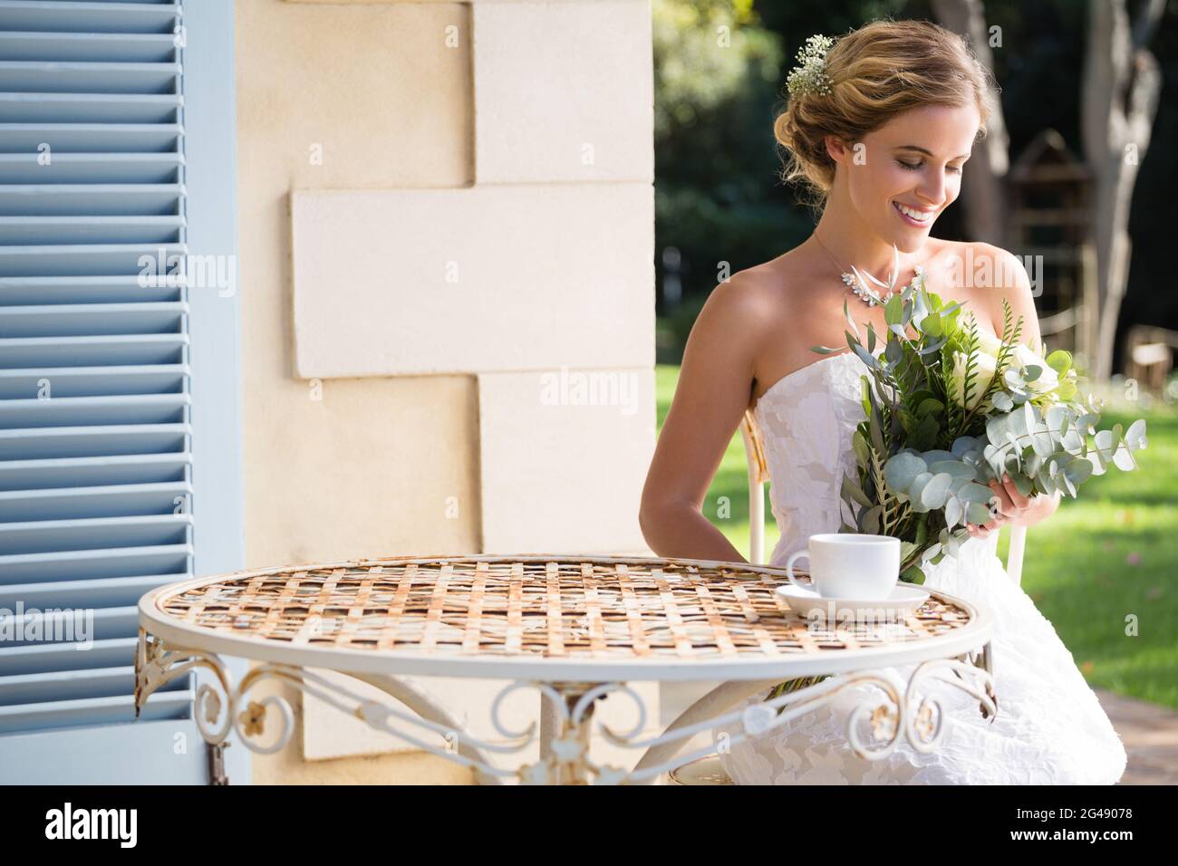 Bride sitting on chair hi-res stock photography and images - Alamy