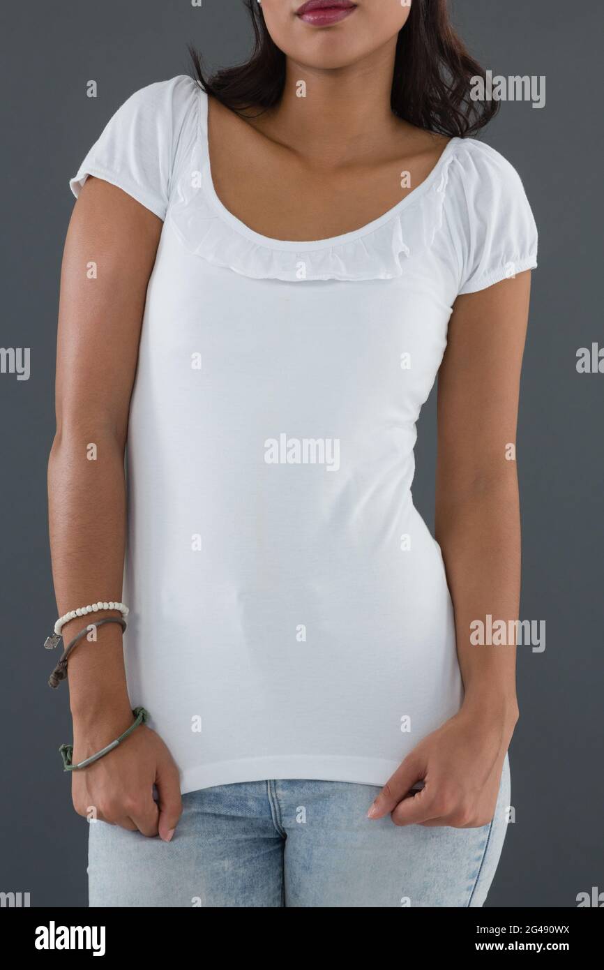 Mid section of young woman Stock Photo - Alamy