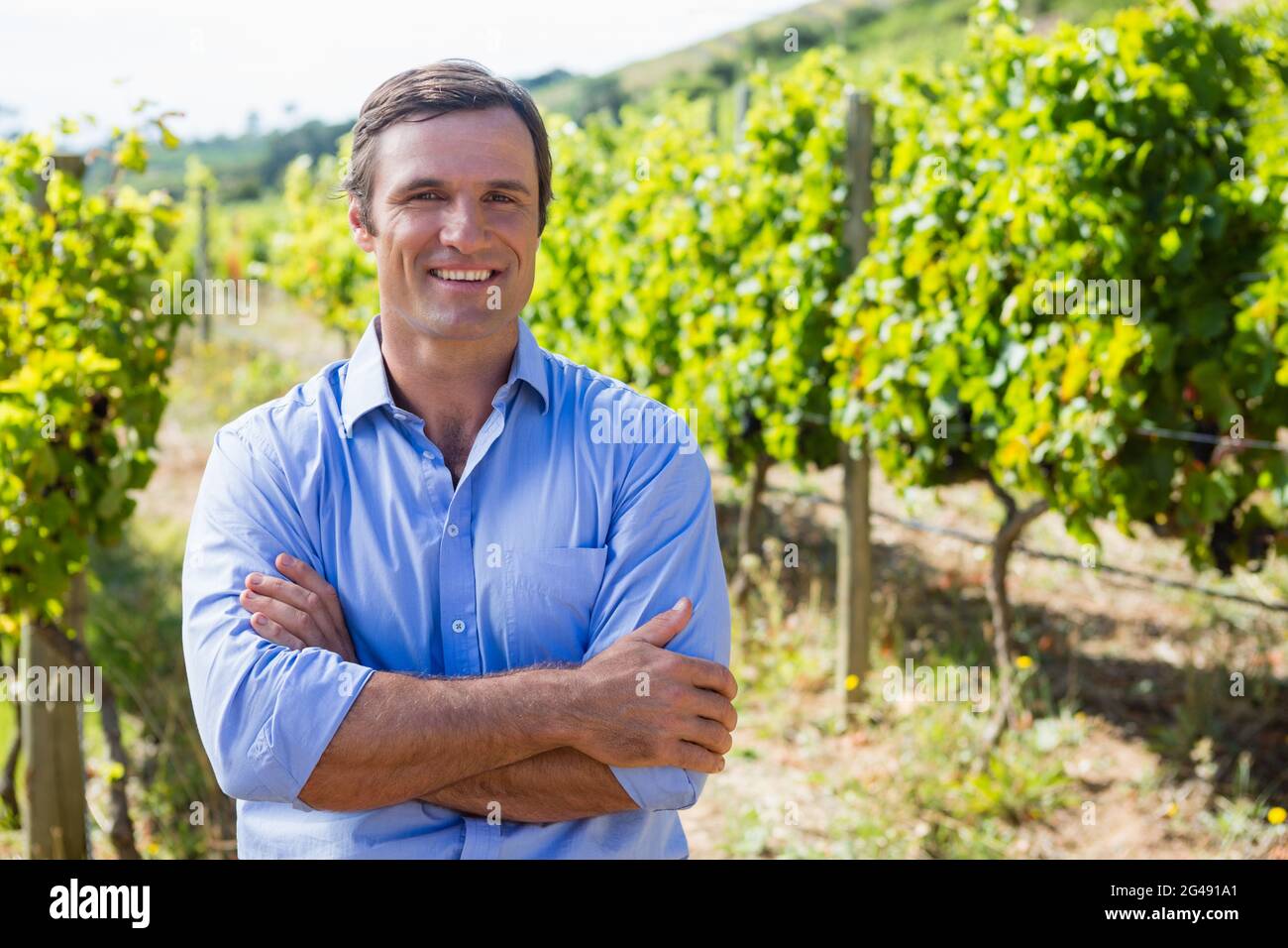 Happy vintner crossed arms hi-res stock photography and images - Alamy