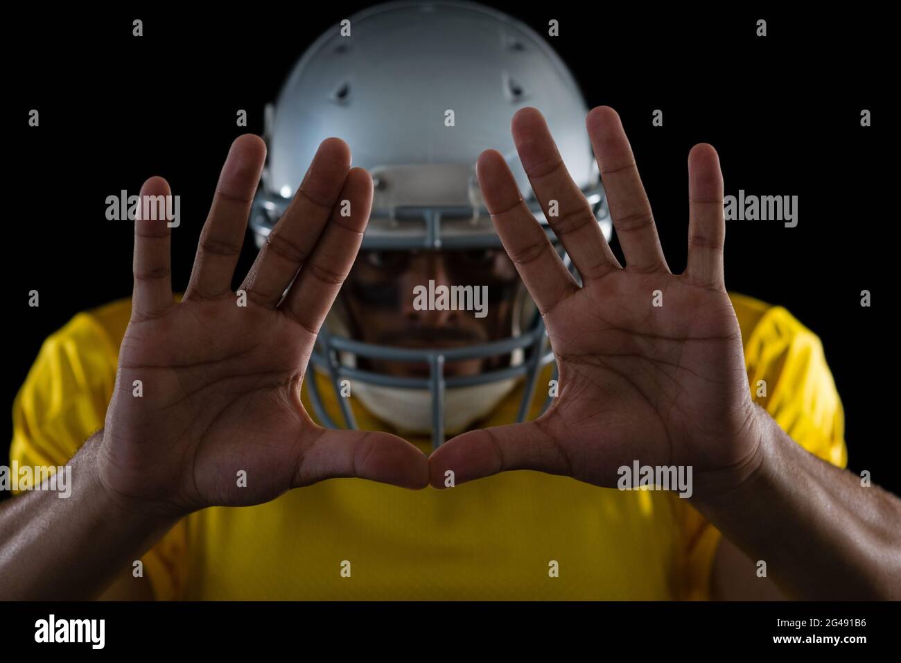 American football player showing hand gestures Stock Photo - Alamy