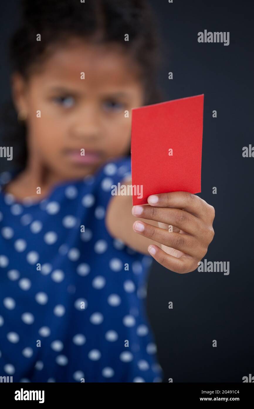 Portrait of girl showing blank red card Stock Photo - Alamy