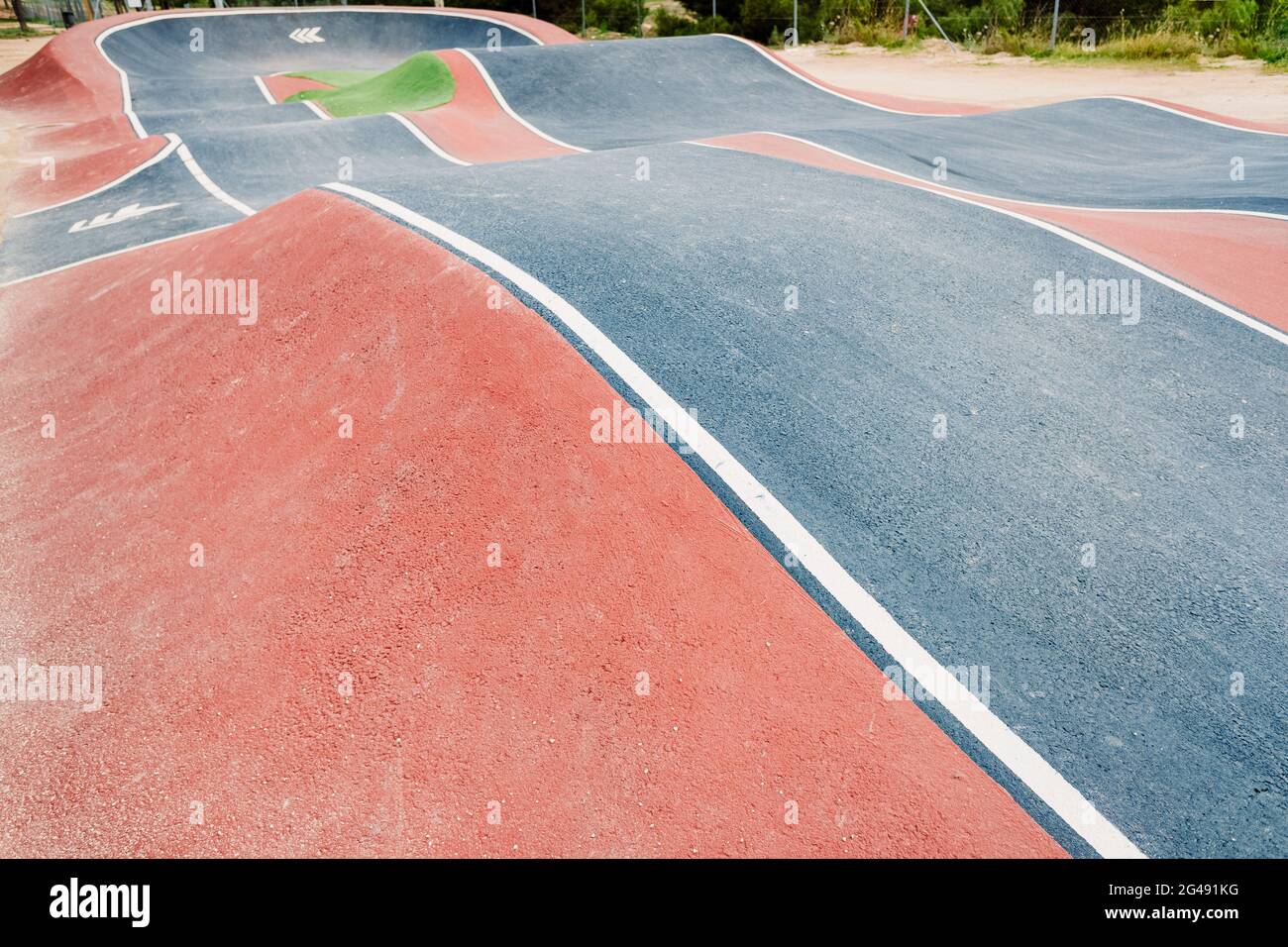 Wavy pump track circuit for skaters with lanes and arrows indicating ...