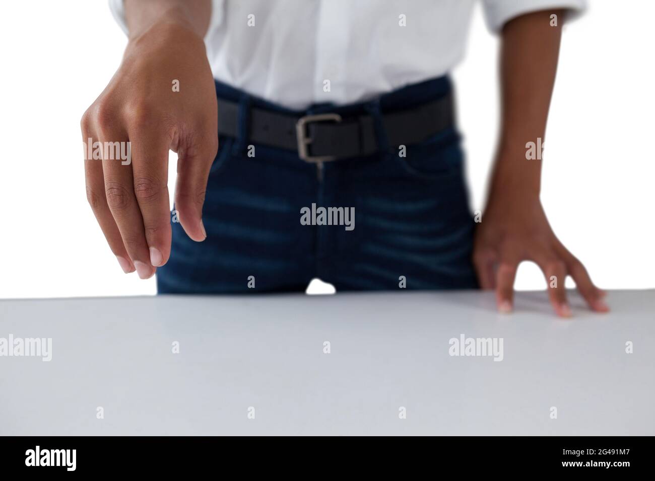 Teenage boy pretending to work on an invisible object Stock Photo - Alamy