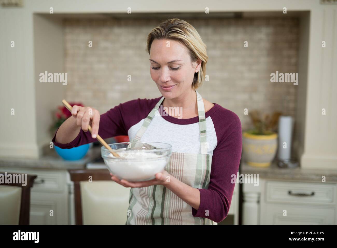 Mixing bowl flour wooden spoon eggs hi-res stock photography and images - Alamy