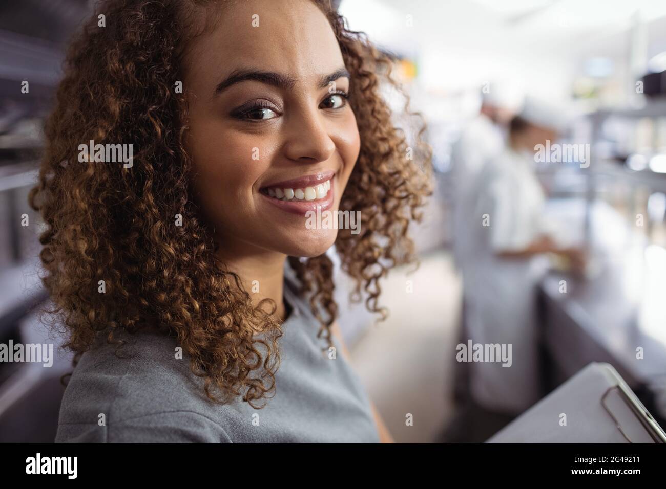 Portrait of smiling restaurant manager Stock Photo - Alamy