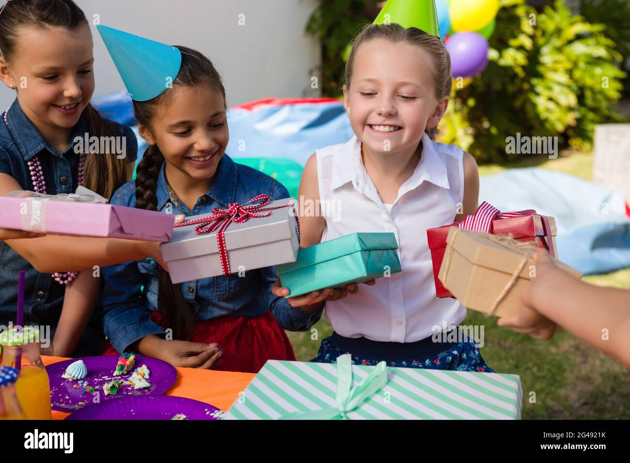 Children receiving gifts hi-res stock photography and images - Alamy