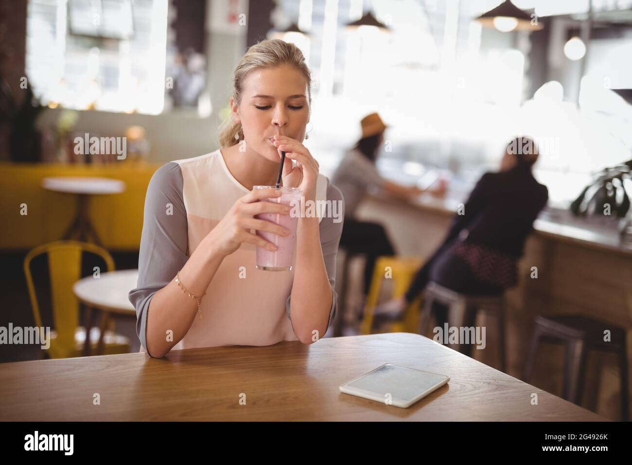 Asian woman drinking milkshake hi-res stock photography and images - Alamy