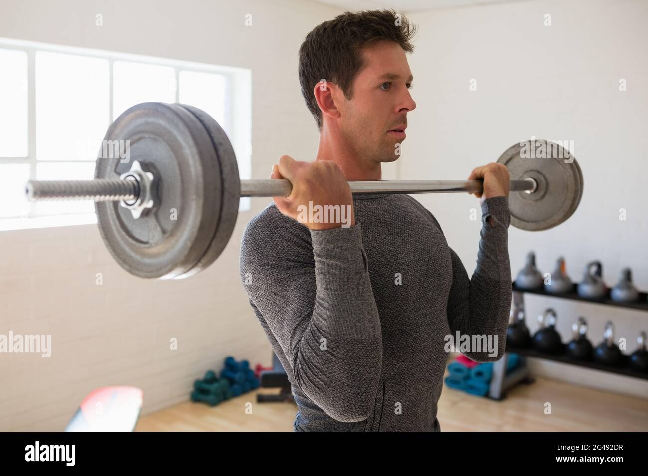 Confident male athlete lifting hi-res stock photography and images - Alamy