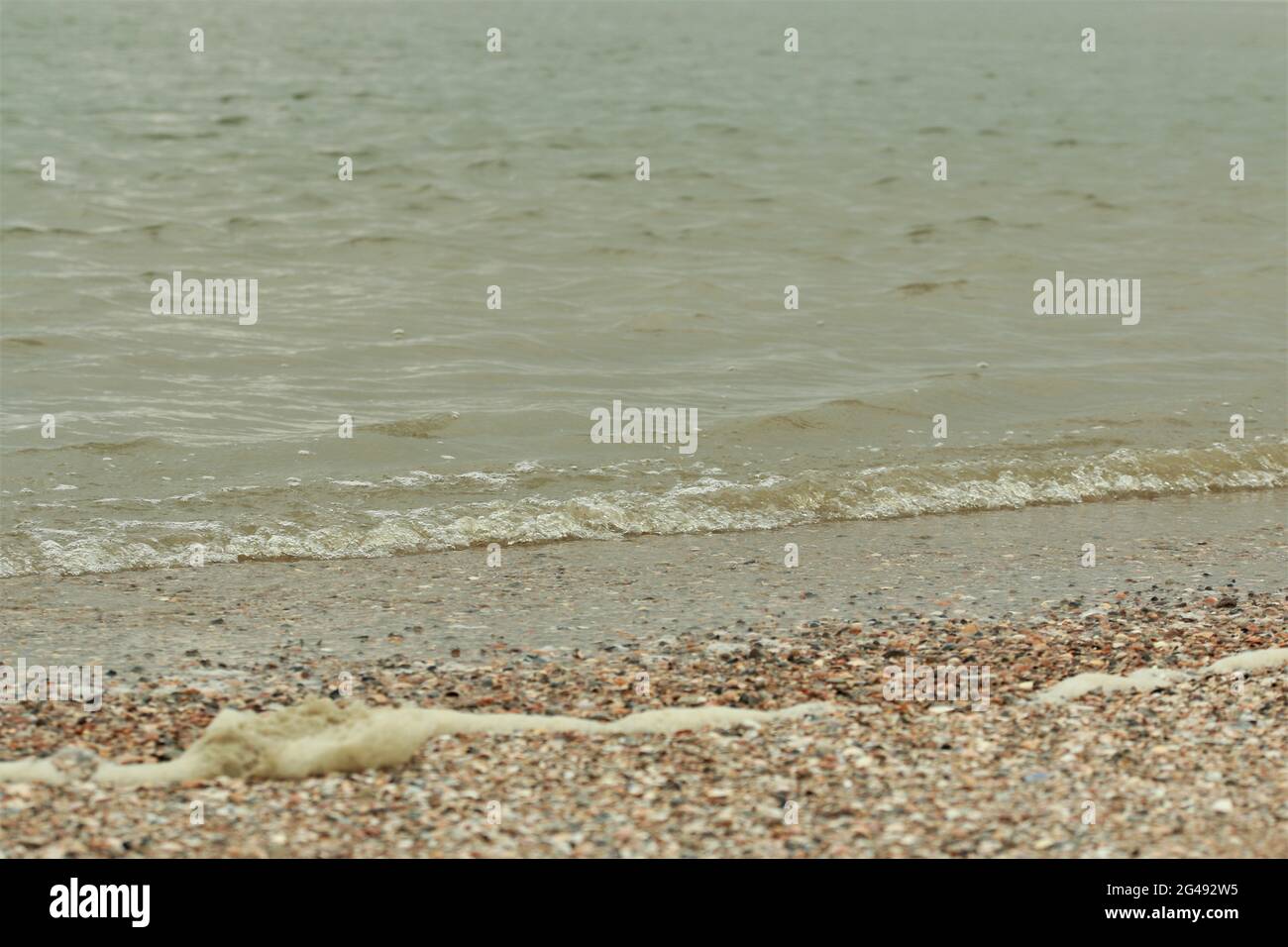 Sandy beach small ocean waves hi-res stock photography and images - Alamy