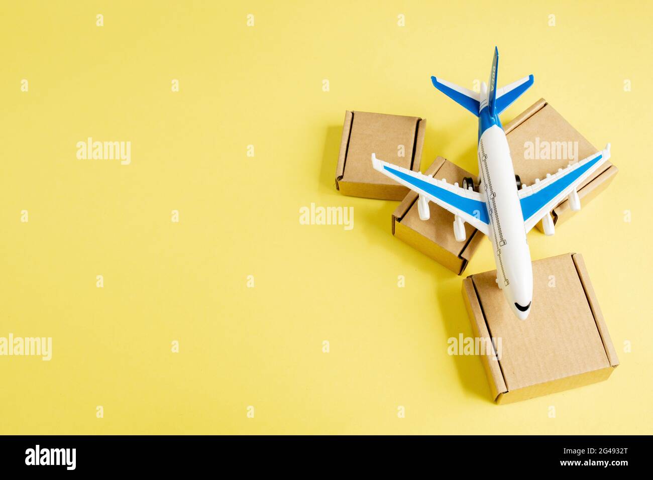 Airplane and stack of cardboard boxes. concept of air cargo and parcels ...