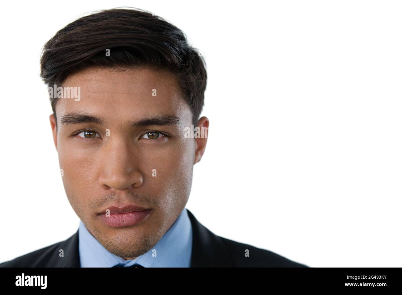 Portrait of businessman with raised eyebrow Stock Photo - Alamy