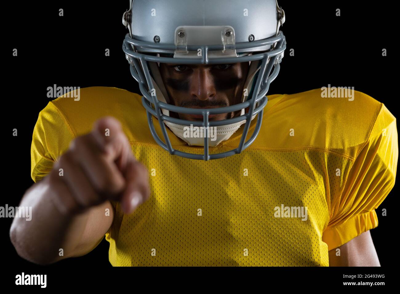 American football player pointing with one hand Stock Photo - Alamy