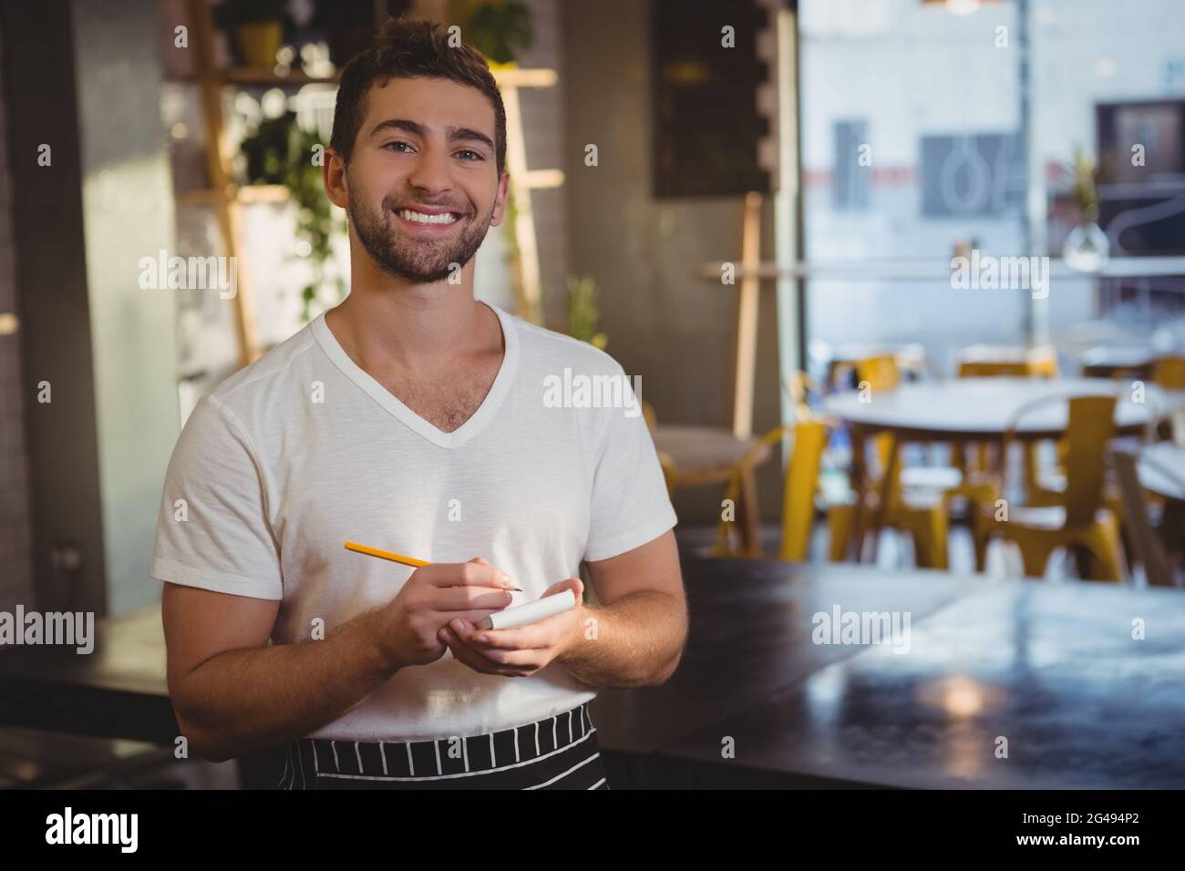 Waiter writing order pad hi-res stock photography and images - Alamy