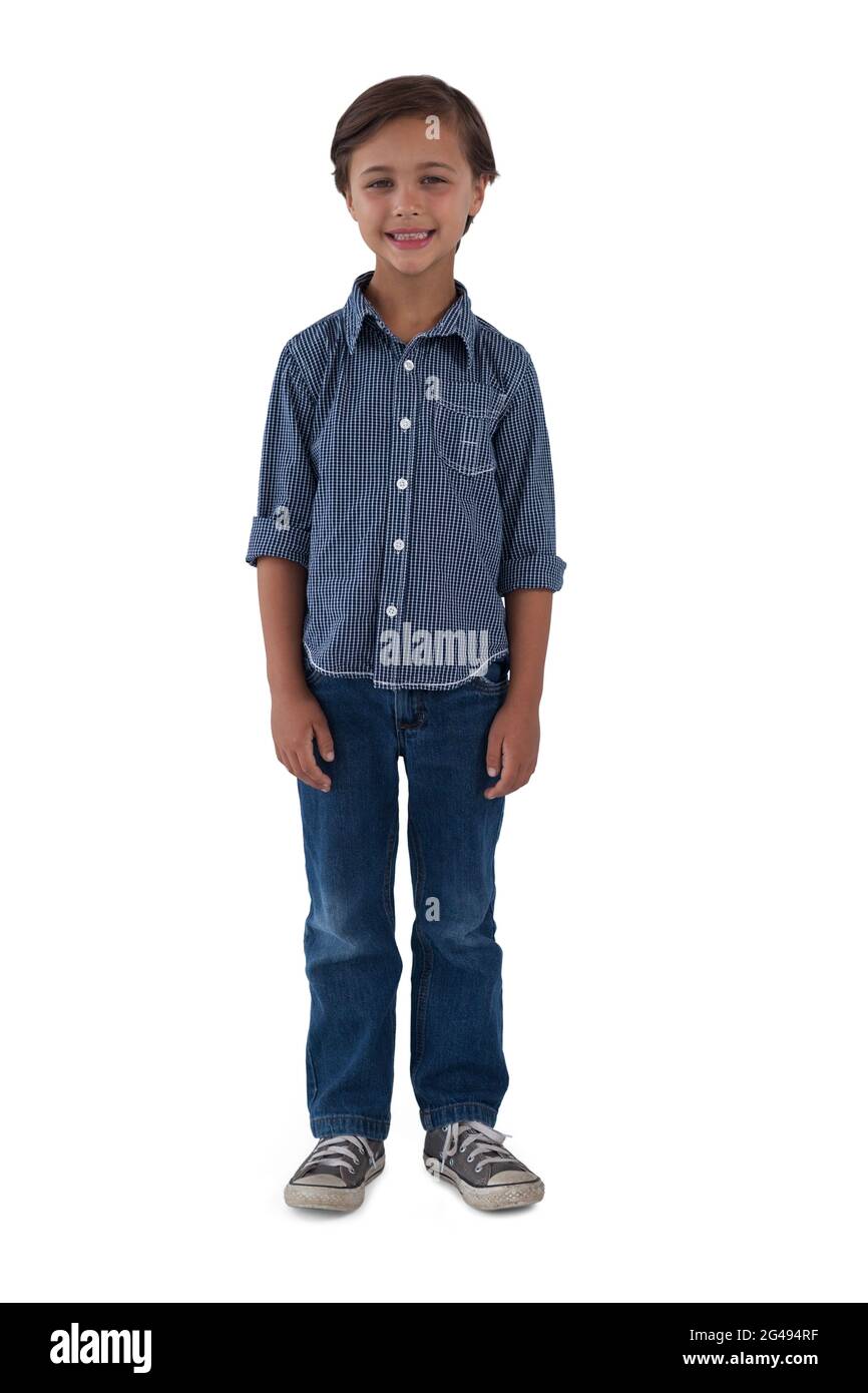 Boy standing against white background Stock Photo - Alamy