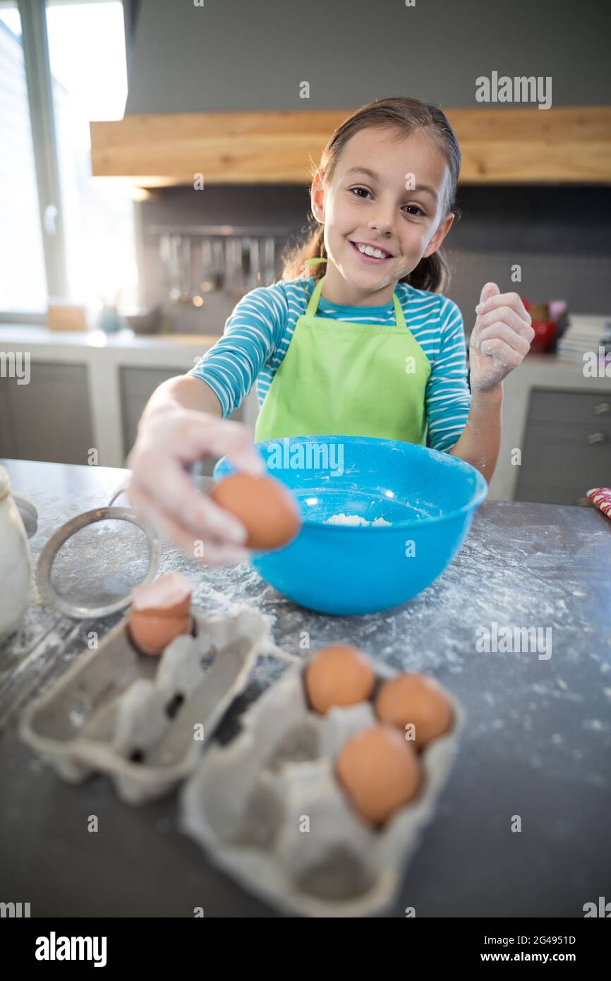 Child picking up an egg hi-res stock photography and images - Alamy