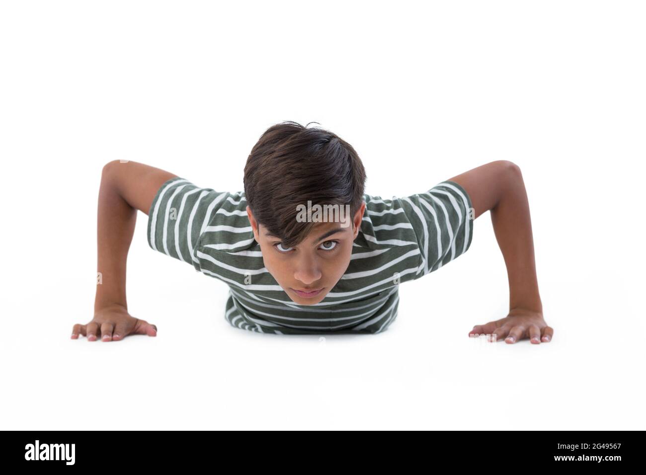 Teenage boy performing push ups Stock Photo - Alamy