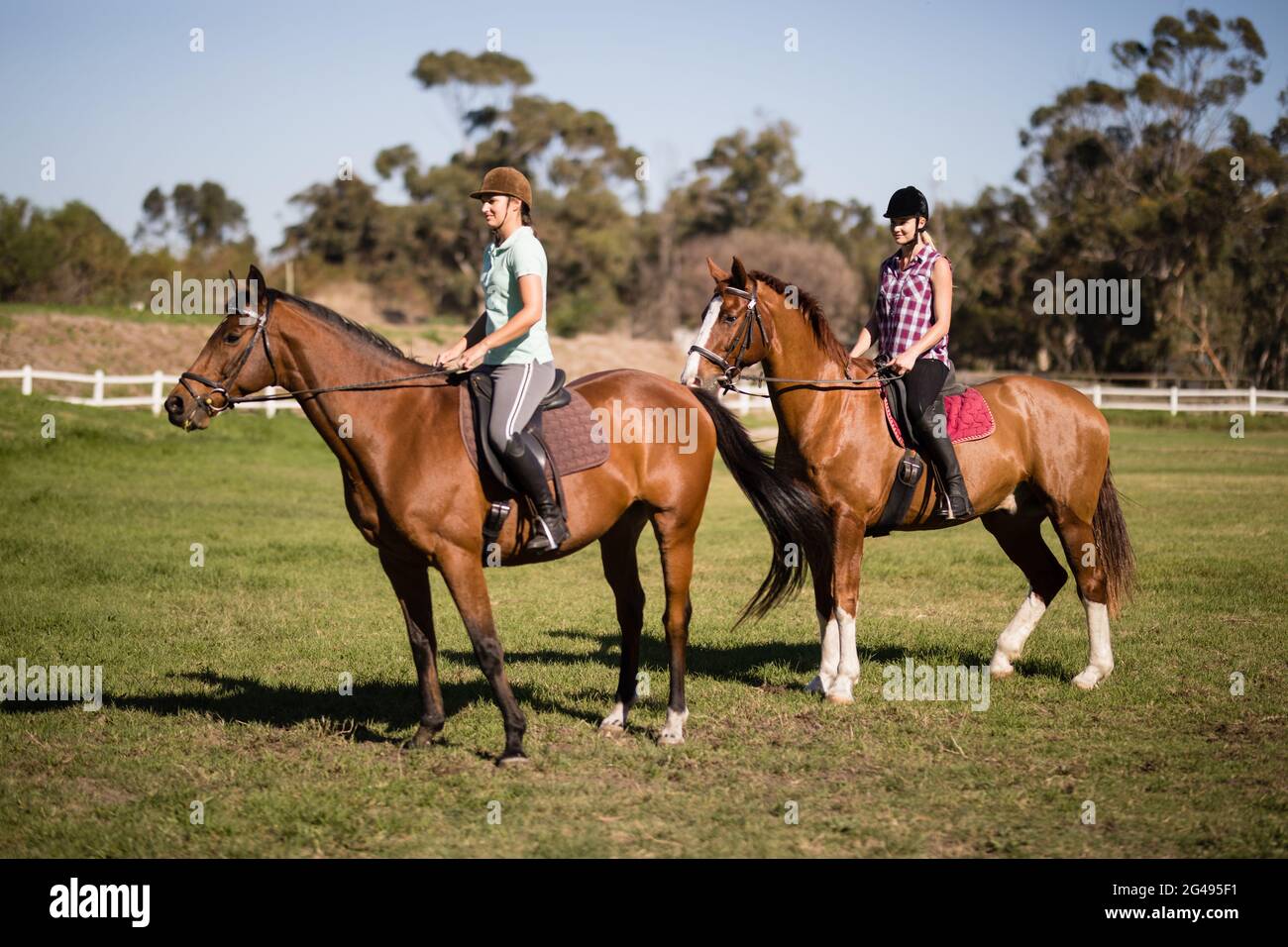 Woman jockey sitting horseback hi-res stock photography and images - Alamy