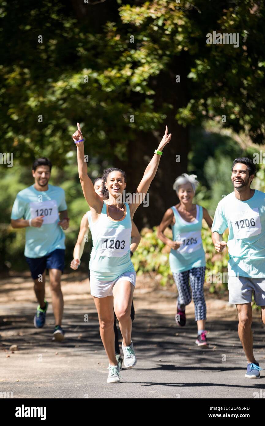Female athlete winning the marathon race Stock Photo - Alamy