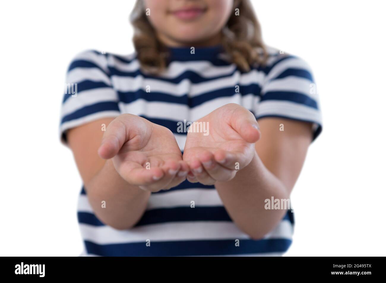 Mid section of girl pretending to be holding invisible object Stock ...