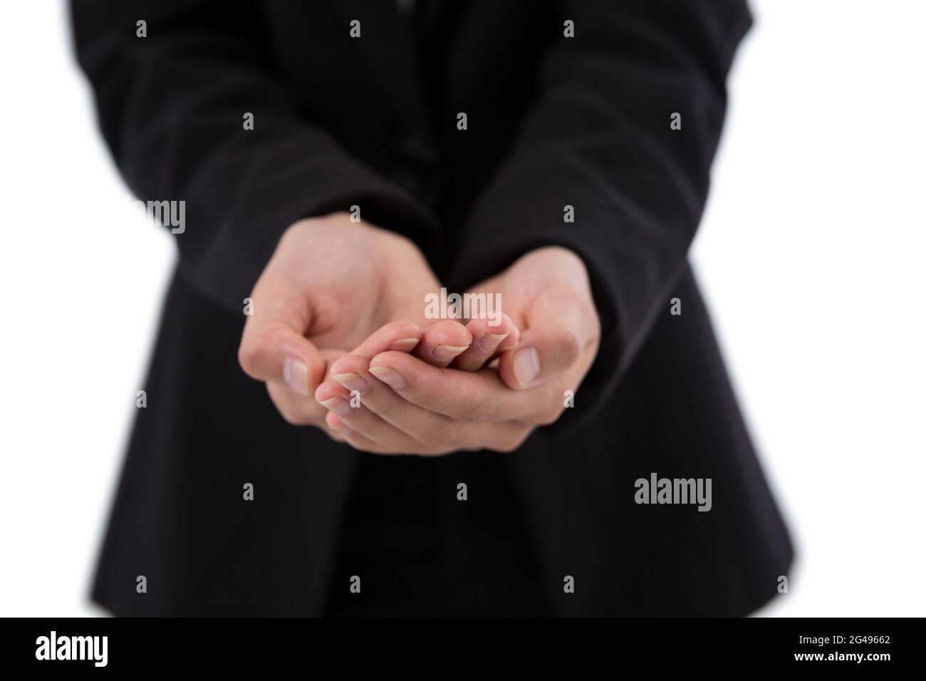 Female executive holding invisible object Stock Photo - Alamy