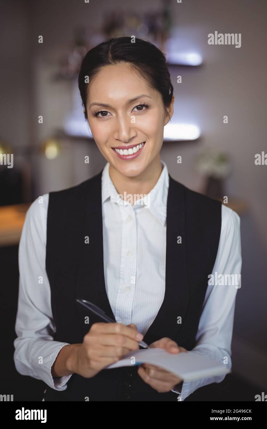 Waitress writing order hi-res stock photography and images - Alamy