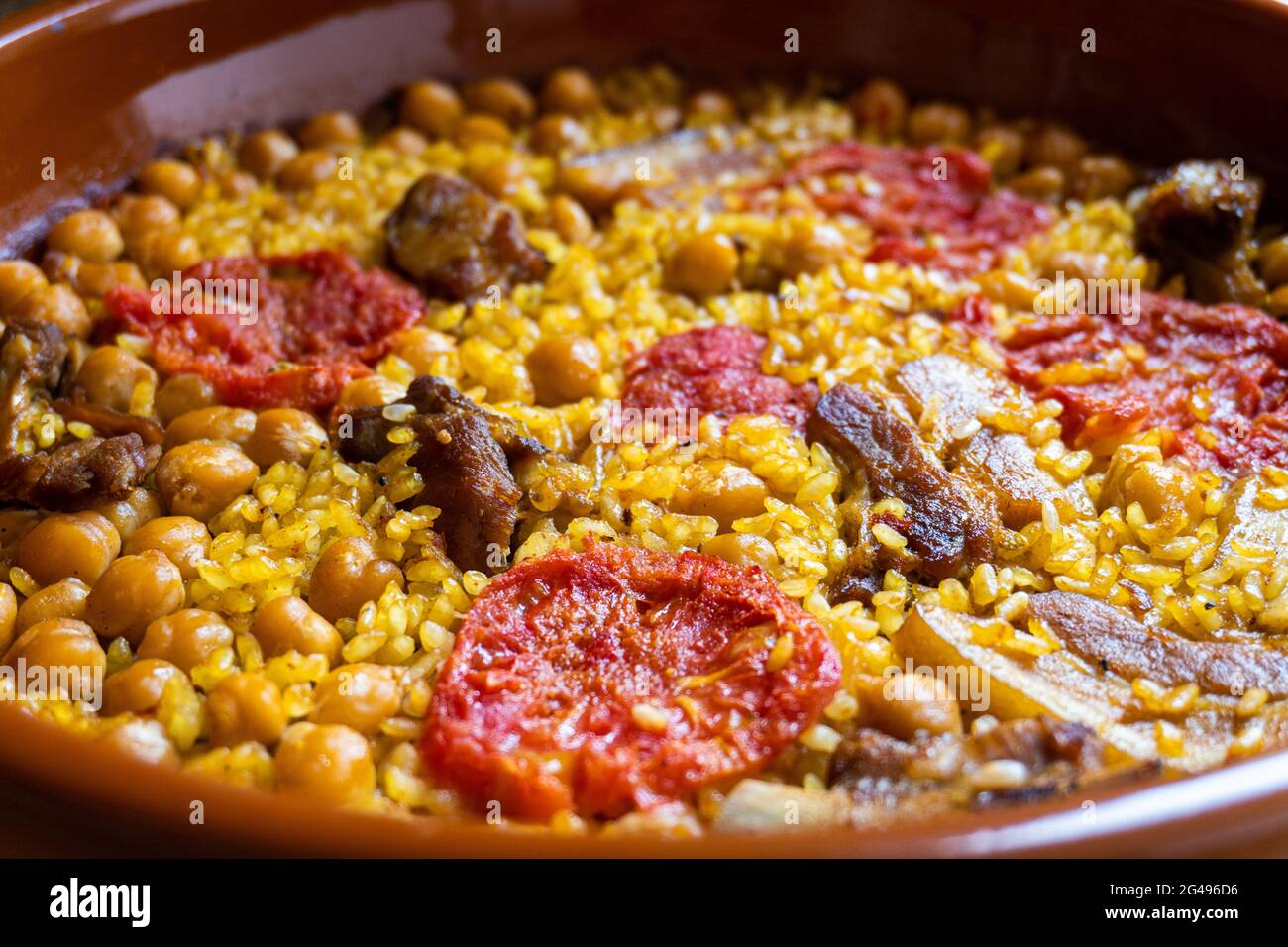 A typical Spanish dish from the Valencian region based on rice, meat ...